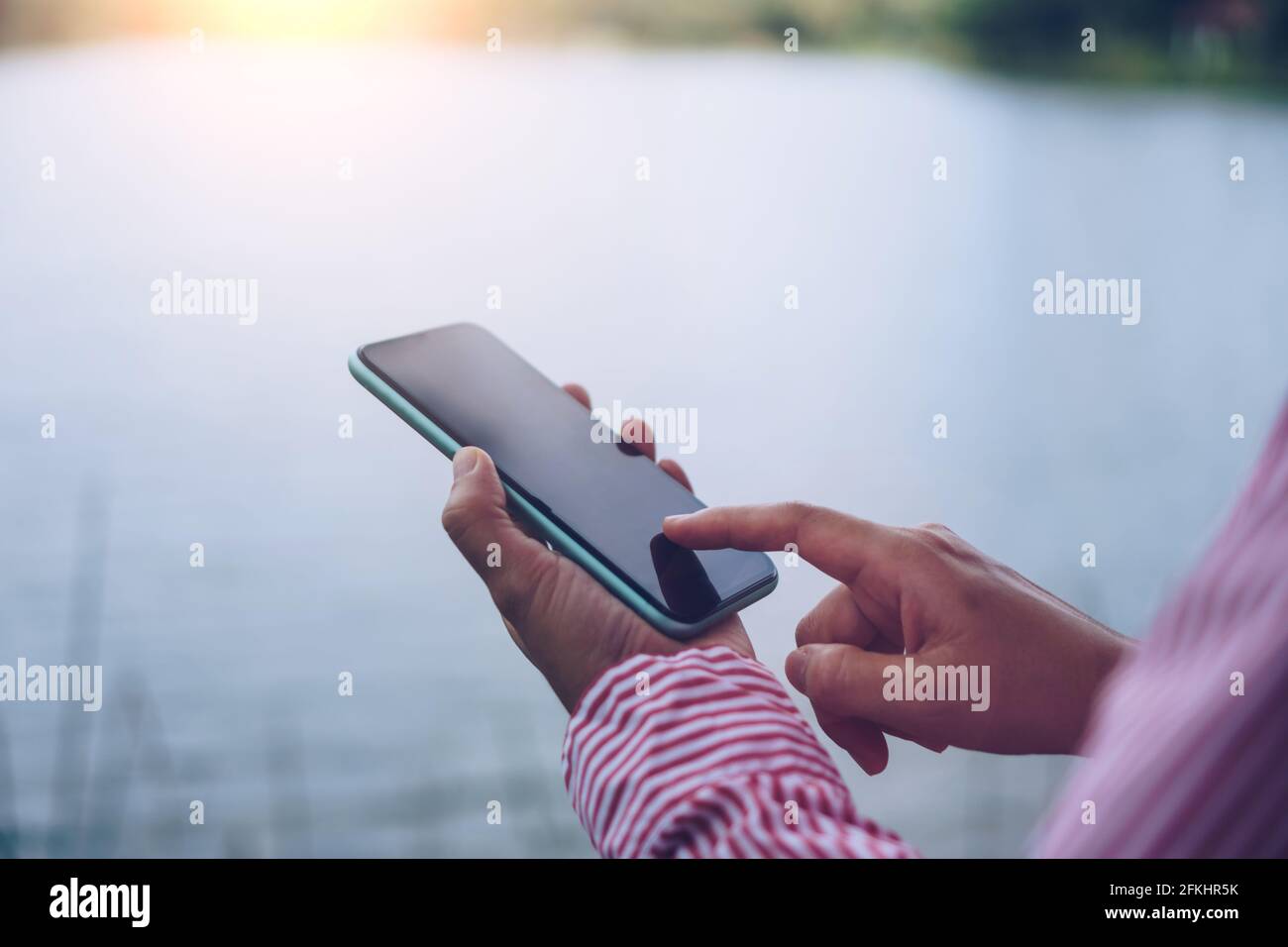 Woman hand using smartphone to do work business, social network ...