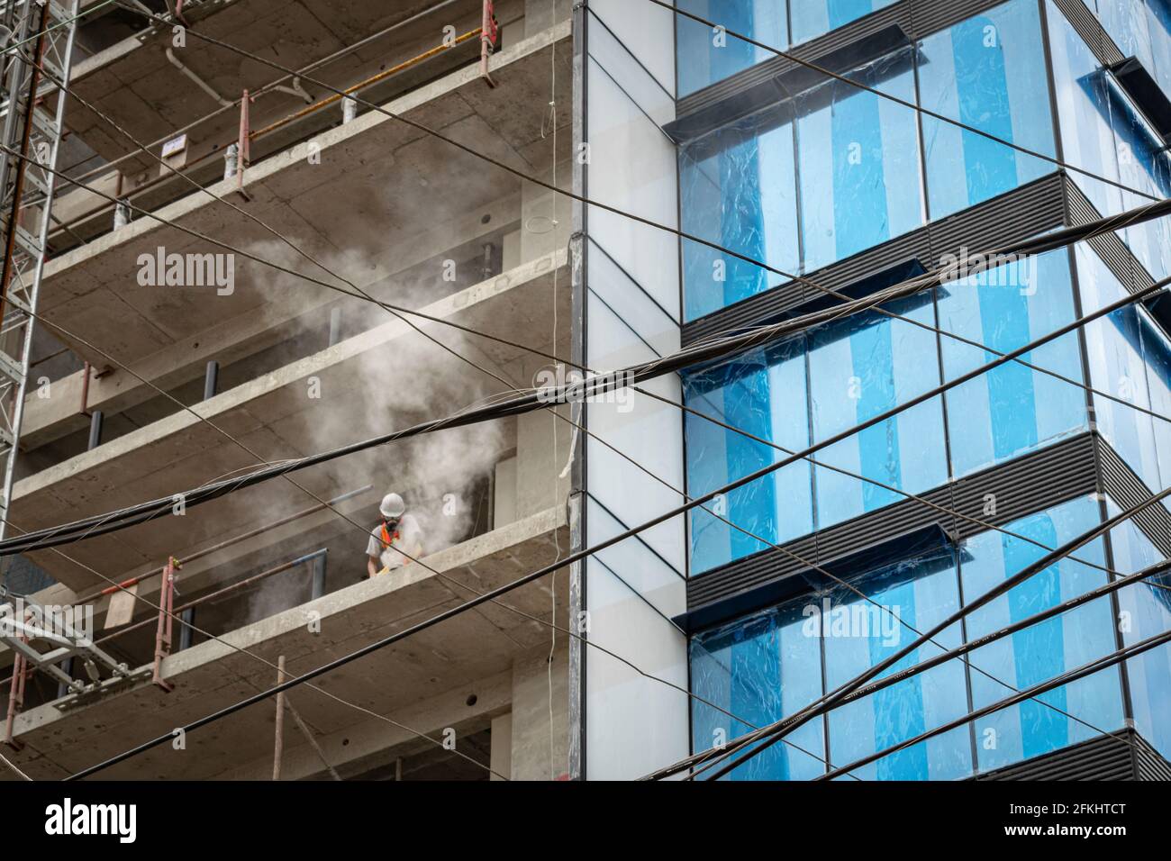 A view at the construction process of a modern skyscraper Stock Photo ...