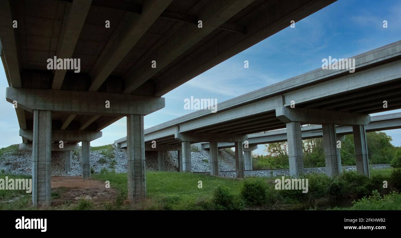 The underside of three on/off ramps at a highway interchange Stock ...