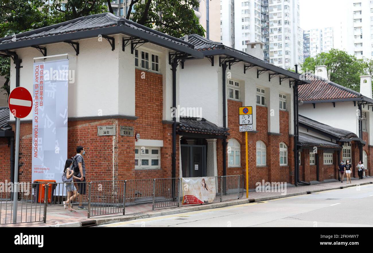 a historical traditional Chinese building with red bricks and roof ...