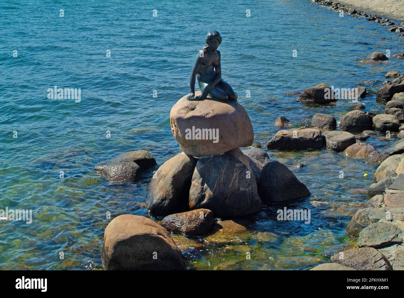 Copenhagen, Denmark - June 23, 2009: The Little Mermaid on the waterside of Langelinie promenade ...
