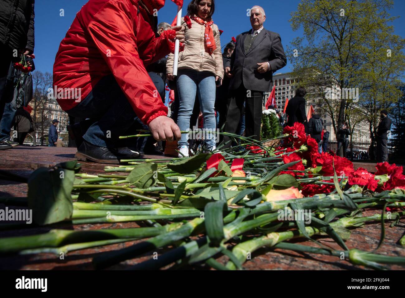 Moscow, Russia. 1st of May, 2021. Communist party's supporters lay ...