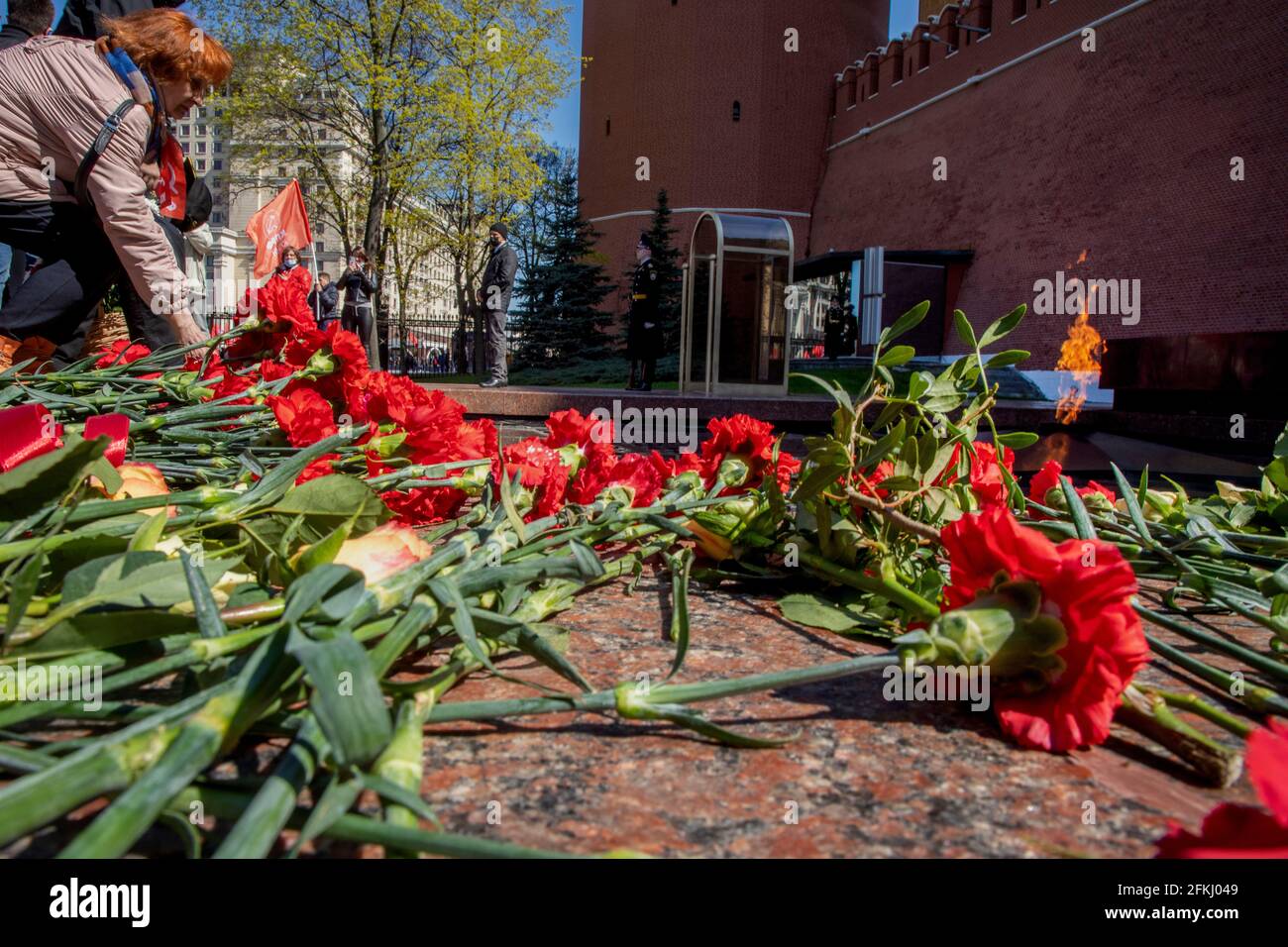 Moscow, Russia. 1st of May, 2021. Communist party's supporters lay ...