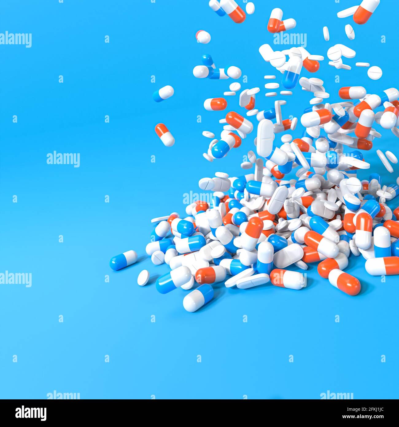 Pills in different forms and colors falling onto a blue background ...