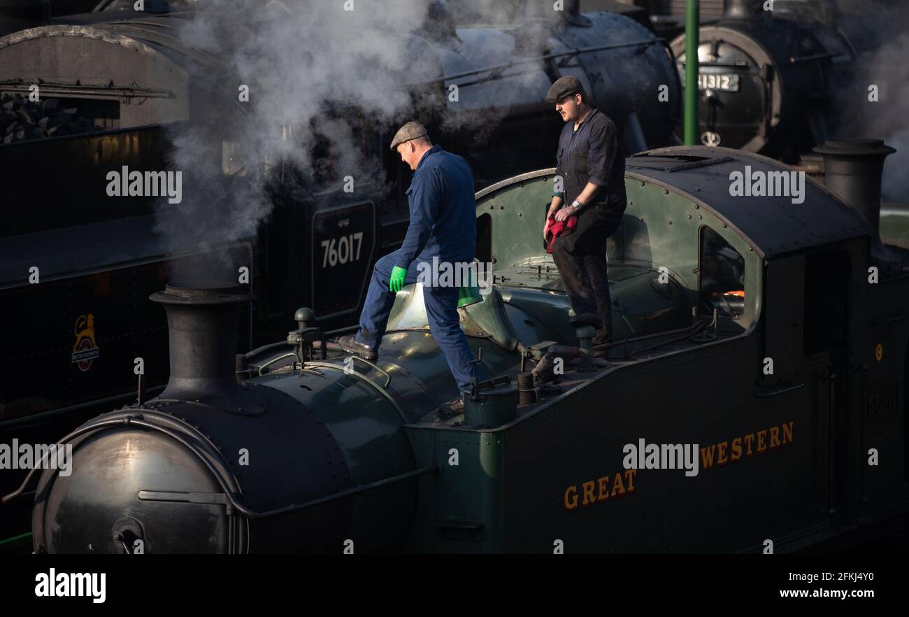 Volunteers work on the GWR ???Small Prairie??? tank engine No. 5526 in ...