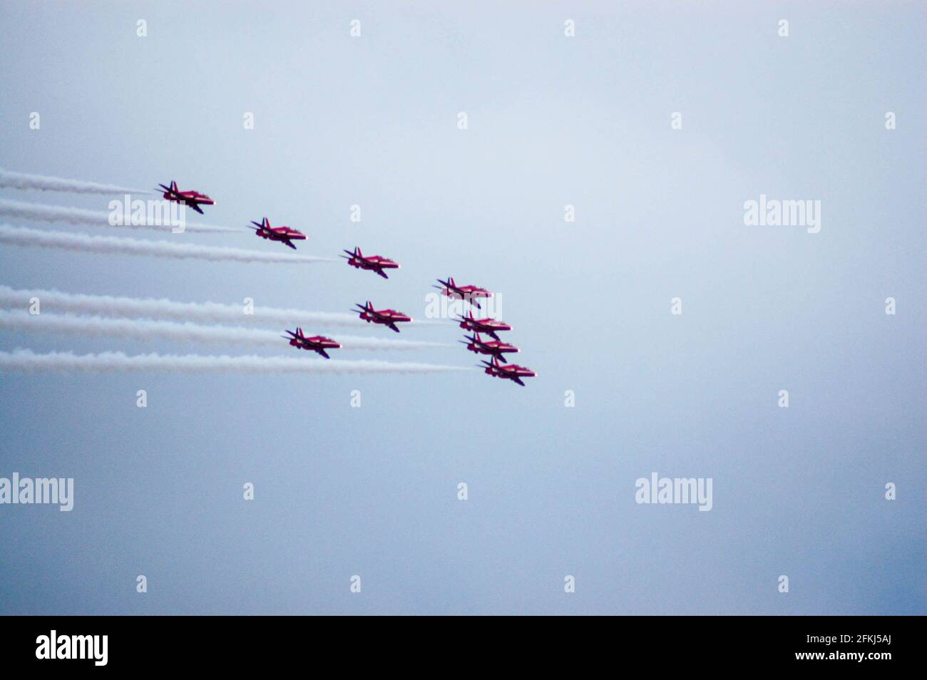 Red Arrows display team at the Jersey air show flying in formation play ...
