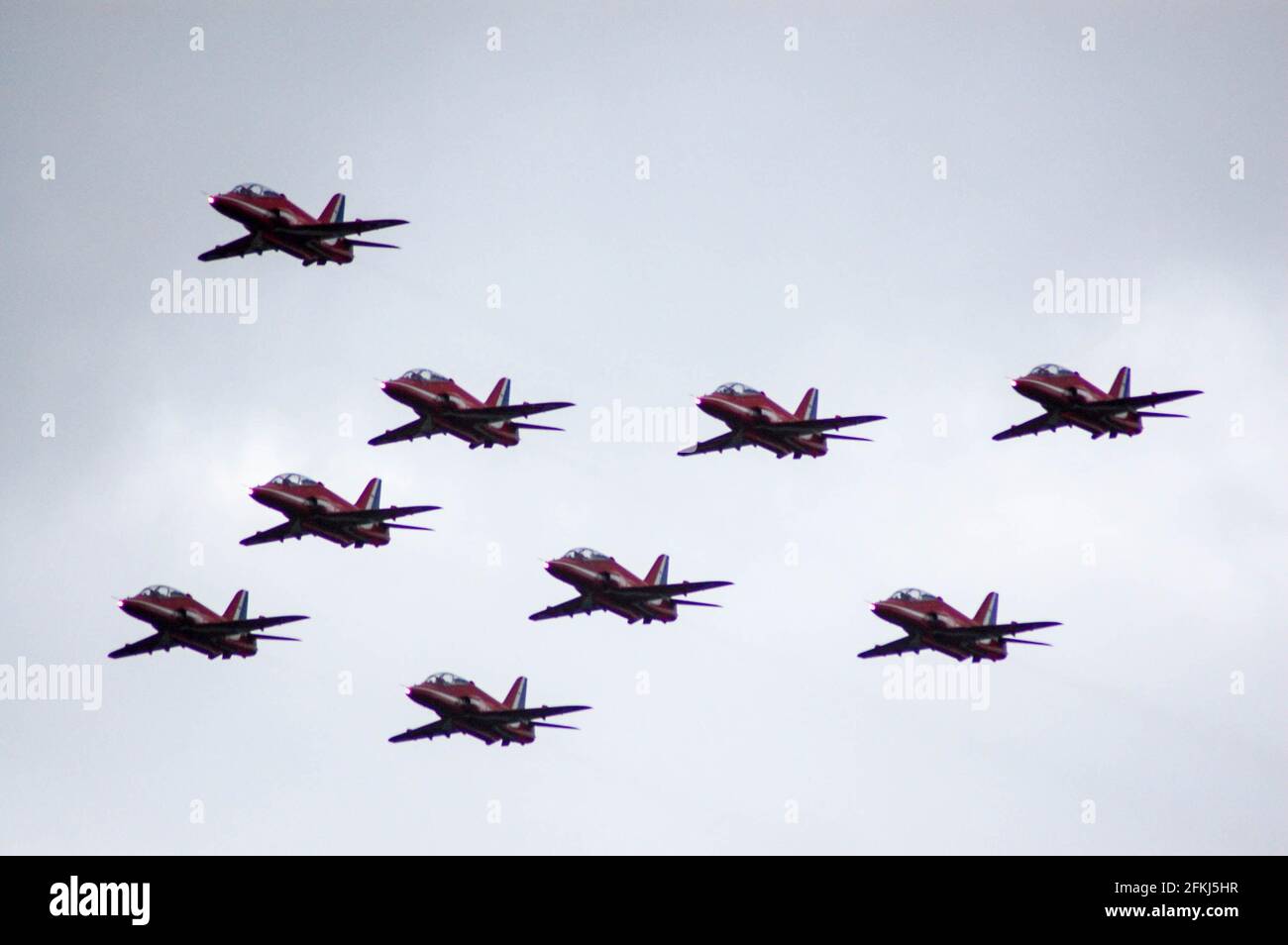 Red Arrows display team jets flying in formation aeroplanes fast speed ...