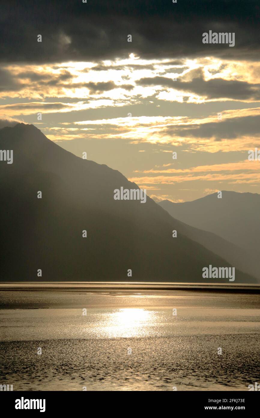 Evening scene of mountains and the sea near Anchorage Alaska USA Stock ...