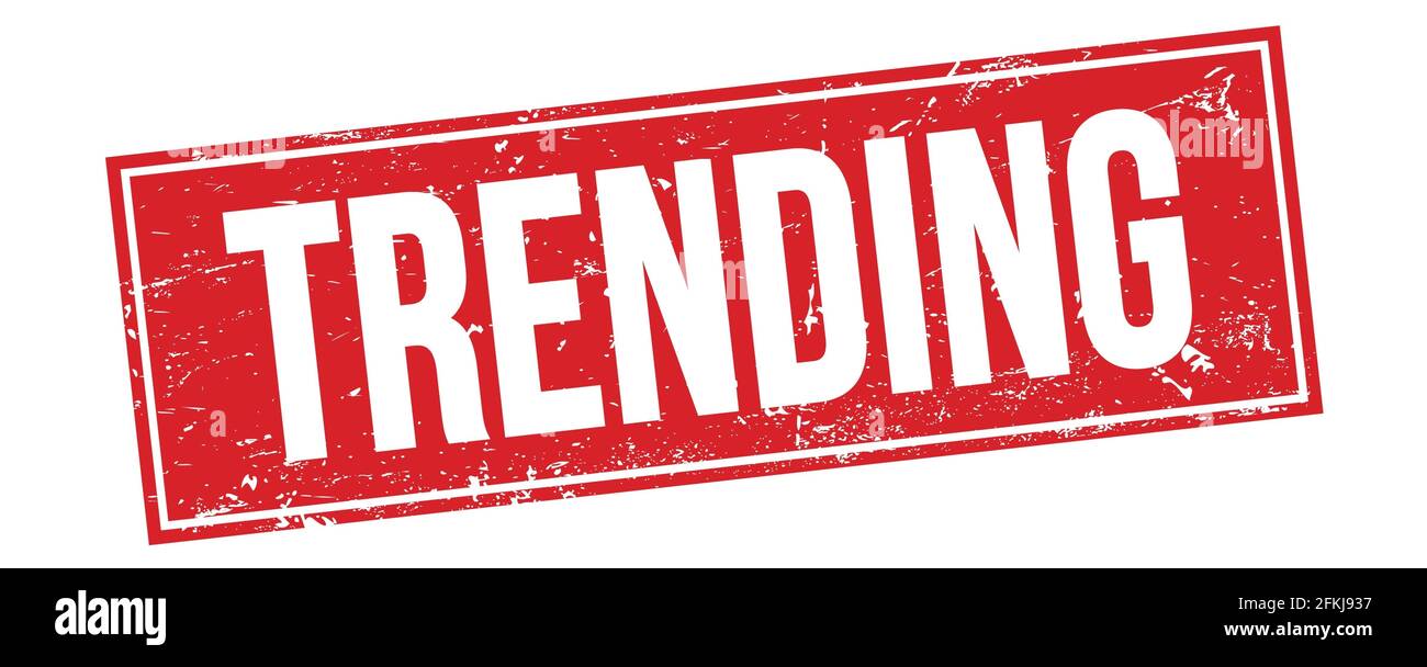 TRENDING text on red grungy rectangle stamp sign Stock Photo - Alamy