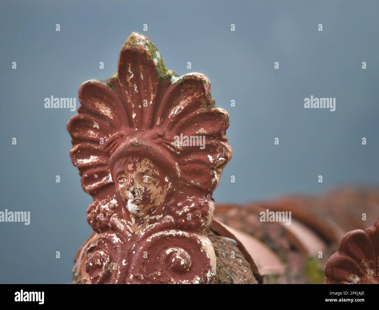 Handcrafted clay akrokeramo piece, a typical architectural element of a ...
