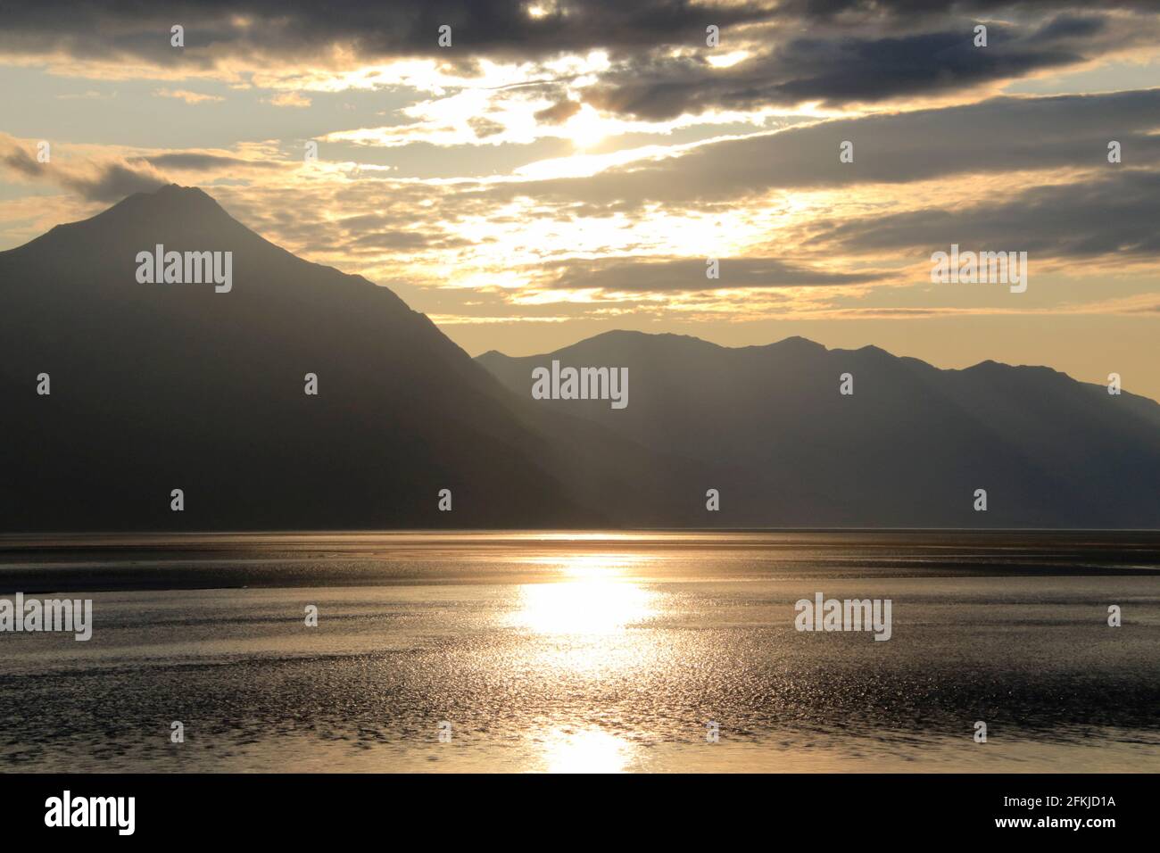 Evening scene of mountains and the sea near Anchorage Alaska USA Stock ...