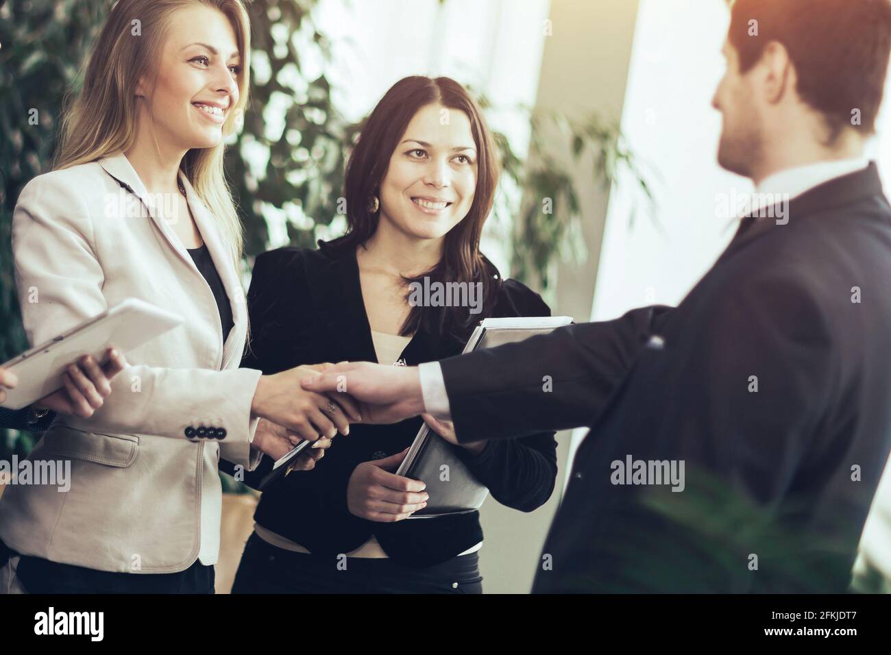 Conference of entrepreneurs. Deals with a handshake Stock Photo - Alamy