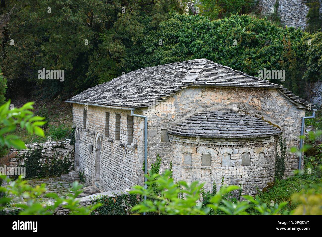 Ancient stone built Greek Orthodox Basilica with a typical slate ...