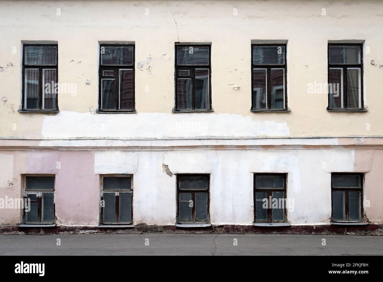 Front view of a vintage russian Moscow house with low located windows ...