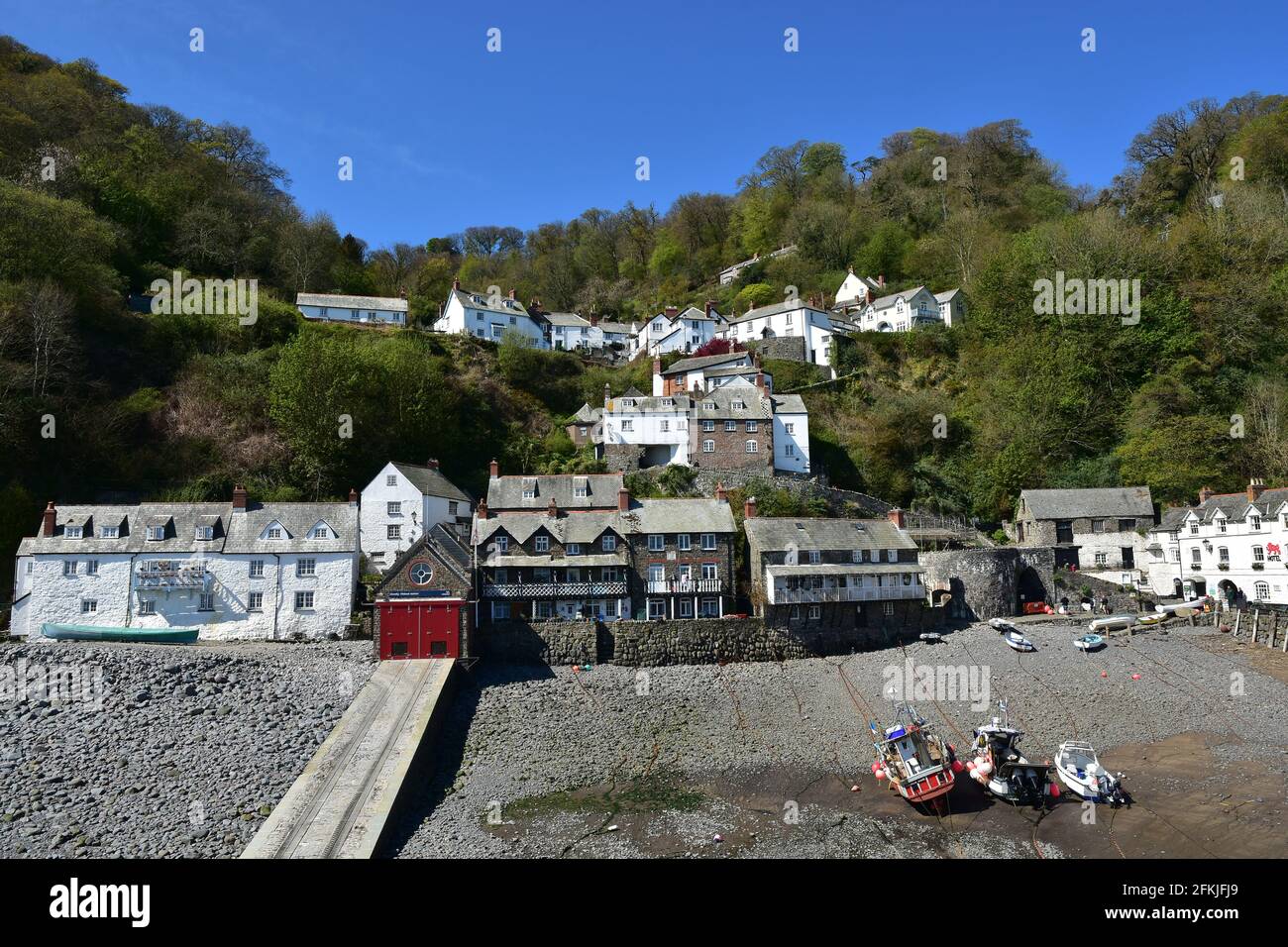 Sea front and houses, Clovelly, North Devon in Spring sunshine Stock ...
