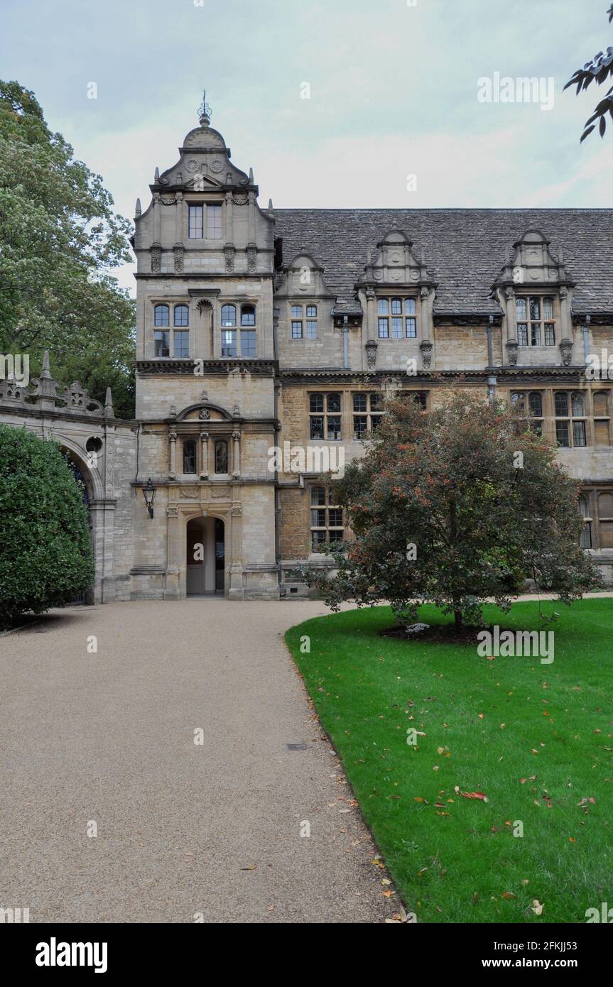 View of building facade, trees & lawn from Trinity College Front Quad ...