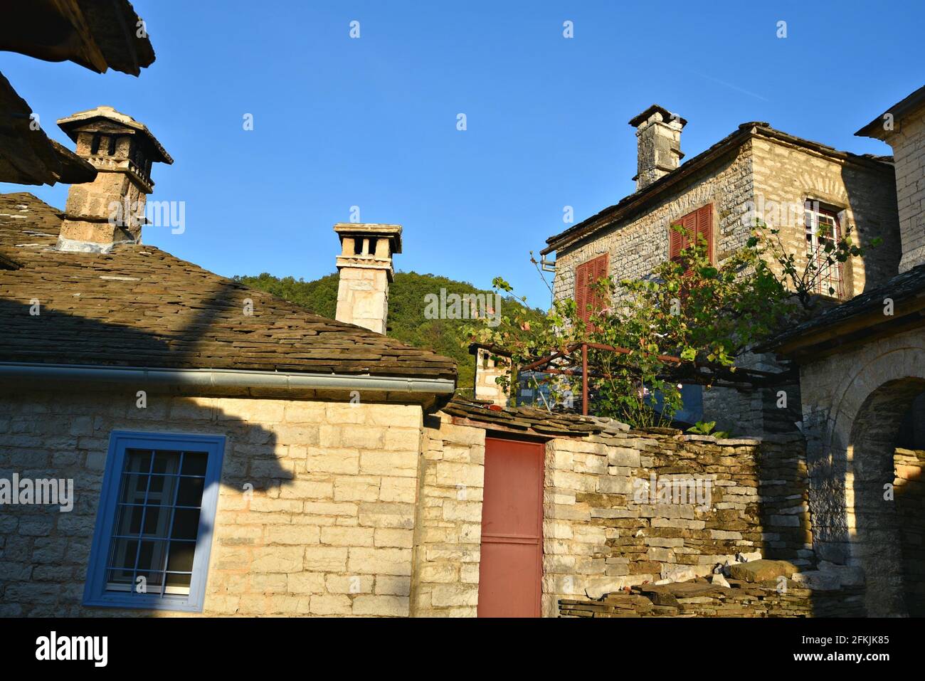Old rural stone houses with slate rooftops in the traditional preserved ...