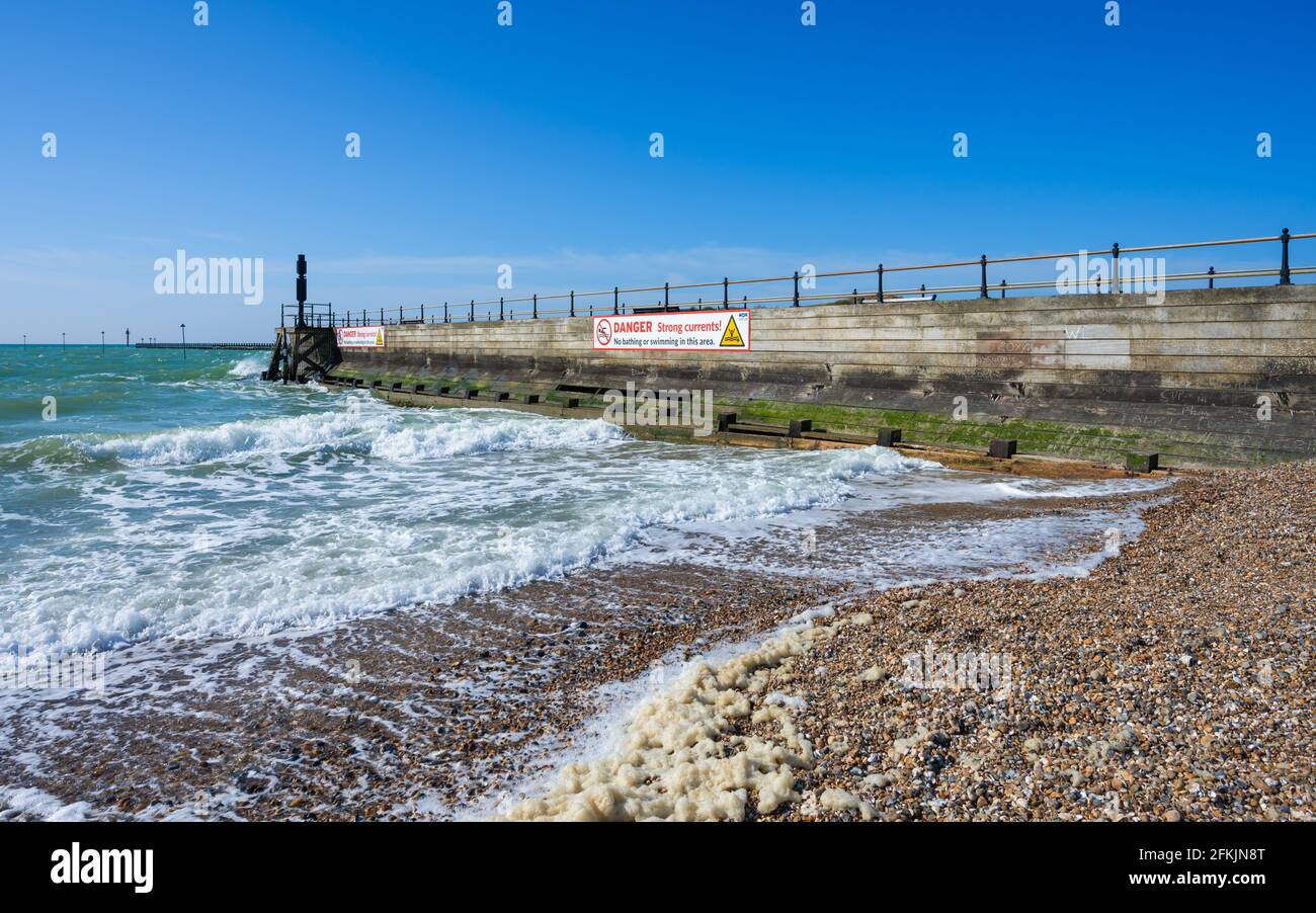 Littlehampton Pier, a wooden pier at a seaside resort at high tide in ...