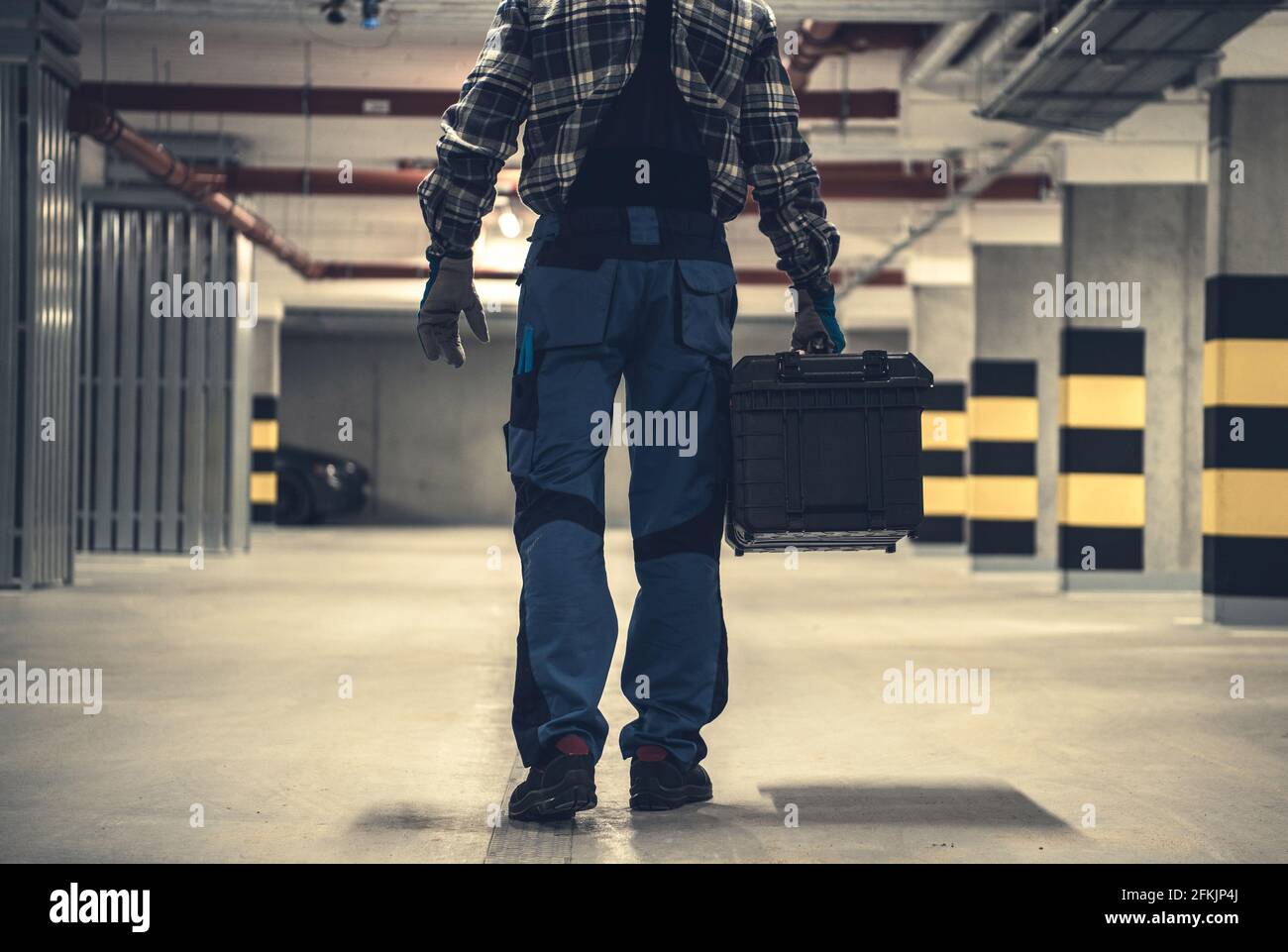 Walking Away Technician Worker with Large Tools Box in Hands Walking ...