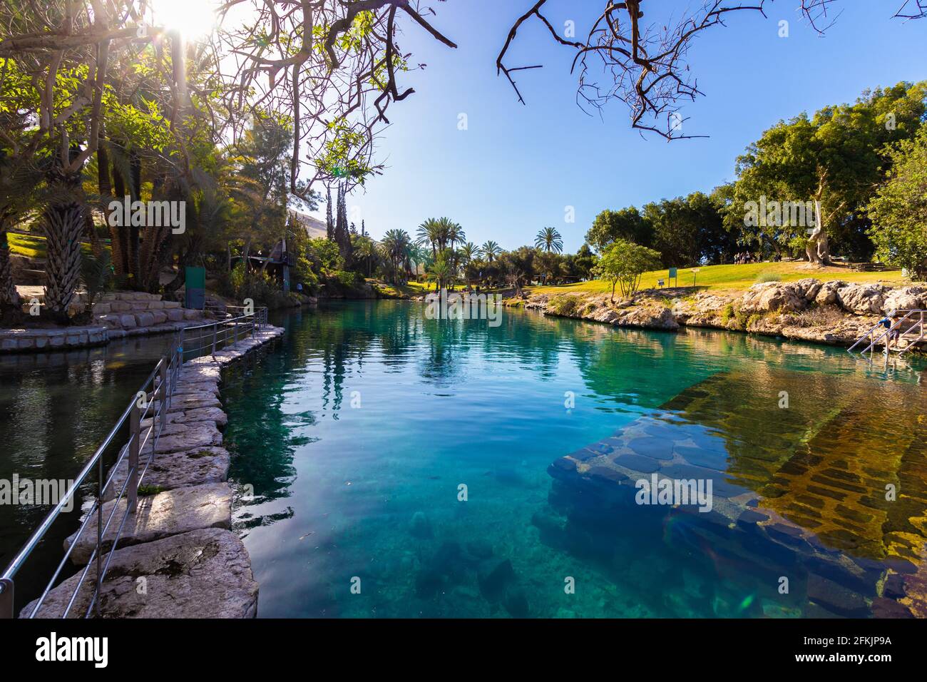 A huge pool of clear turquoise water, in Gan Hashlosha Park in the Beit ...