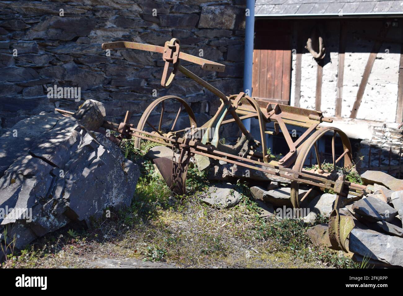 rusty farming equipment Stock Photo - Alamy