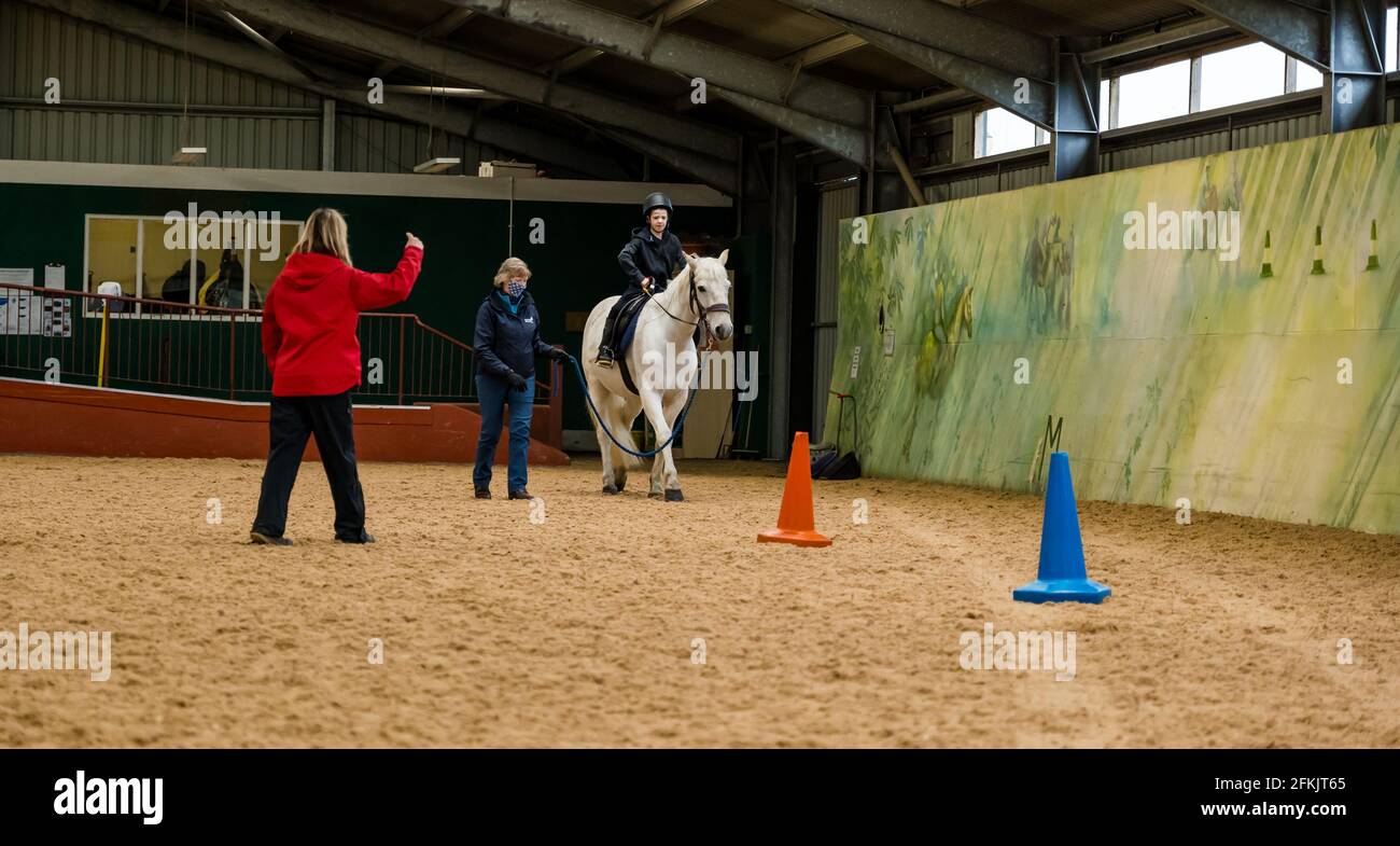 Disabled boy horse riding hi-res stock photography and images - Alamy
