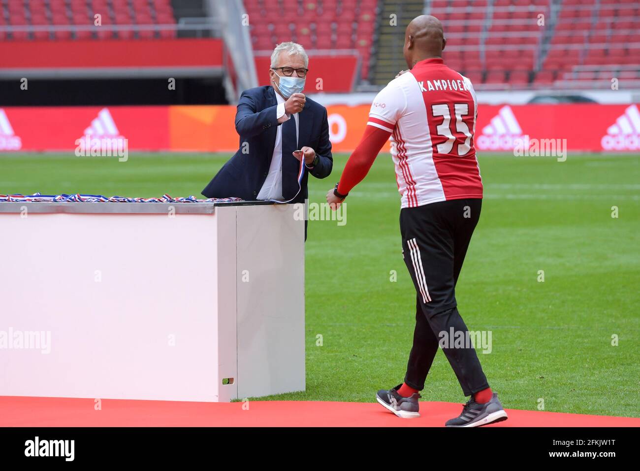 AMSTERDAM, NETHERLANDS - MAY 2: Winston Bogarde of Ajax and Eric Gudde ...