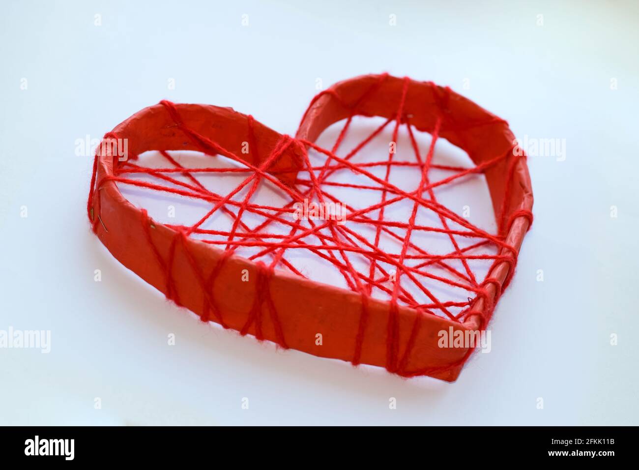 Red threads hi-res stock photography and images - Alamy