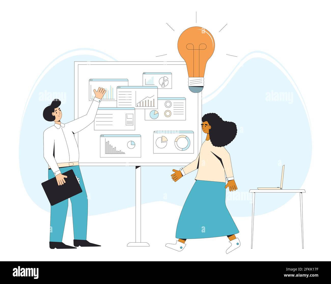 Presentation. Two professionals working together on a project report ...