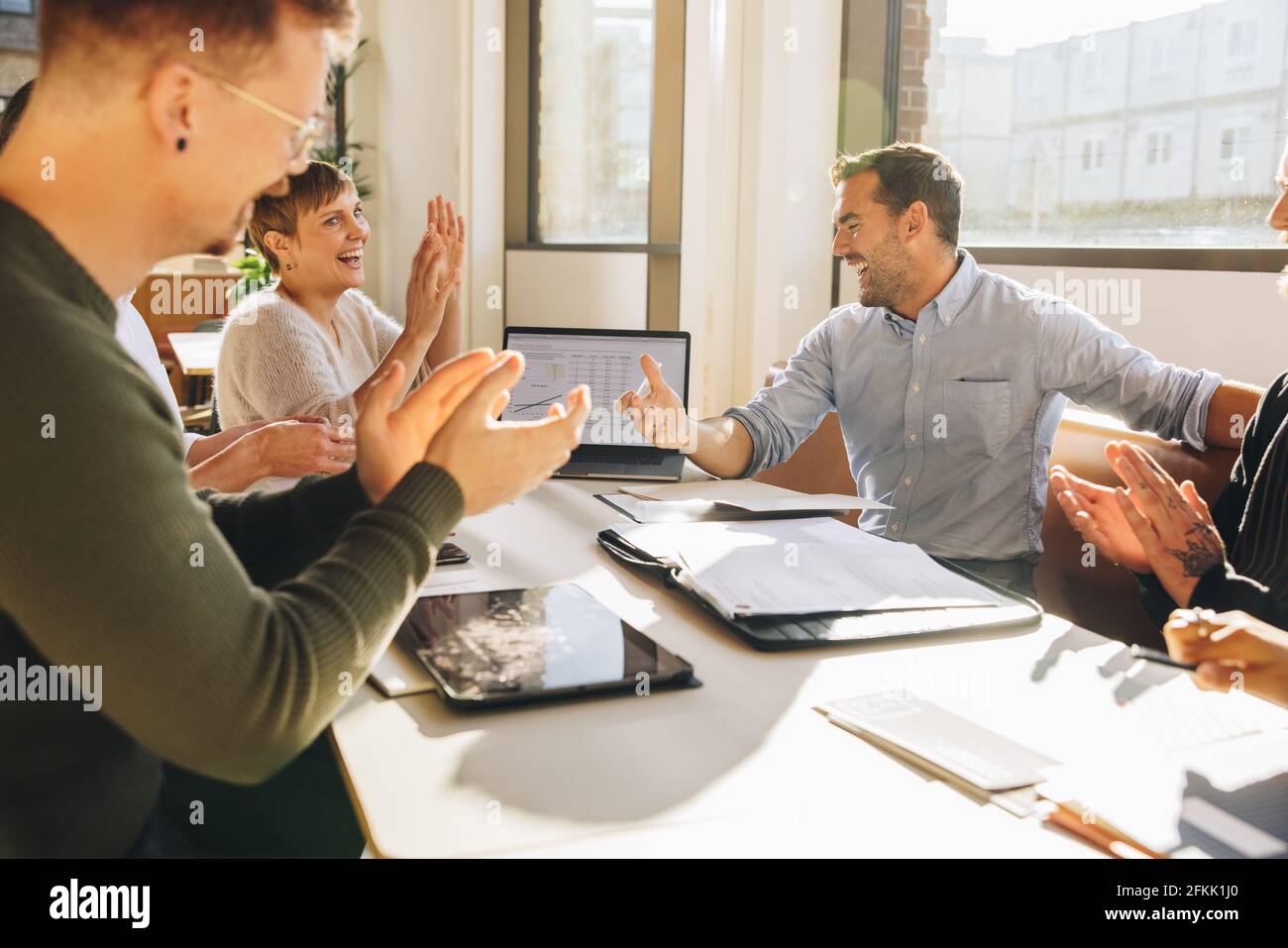 Applauding clapping creative man appreciating hi-res stock photography ...