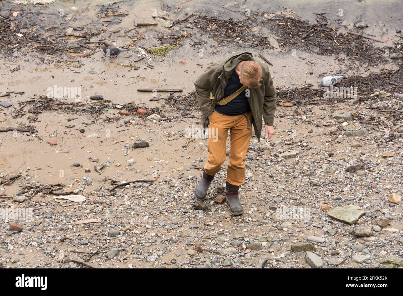 Mudlarking man hi-res stock photography and images - Alamy