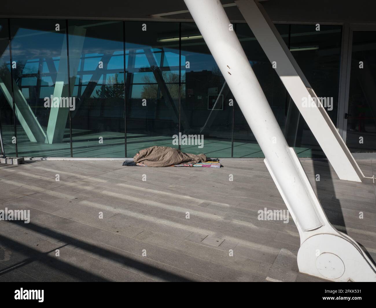 Homeless people sleeping under bridge hi-res stock photography and ...