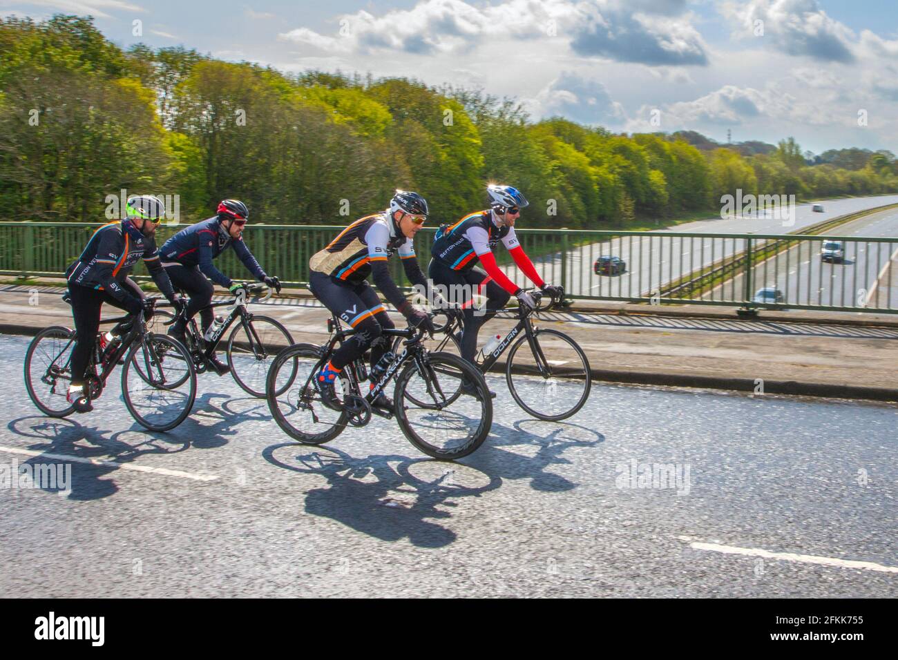 Sefton Velo cycling club outing; Male cyclists riding sports road bike ...