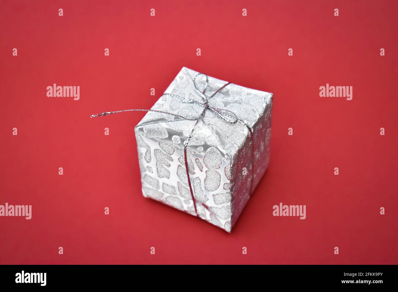Tiny red shiny box hi-res stock photography and images - Alamy