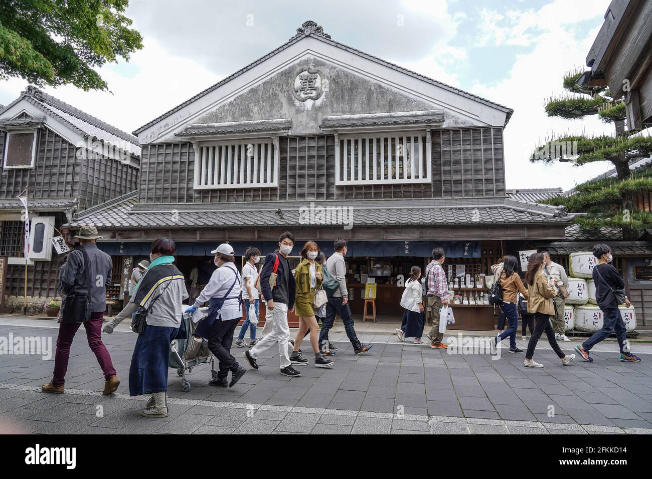 Ise, Japan. 02nd May, 2021. People wearing face masks walk on a tourist ...