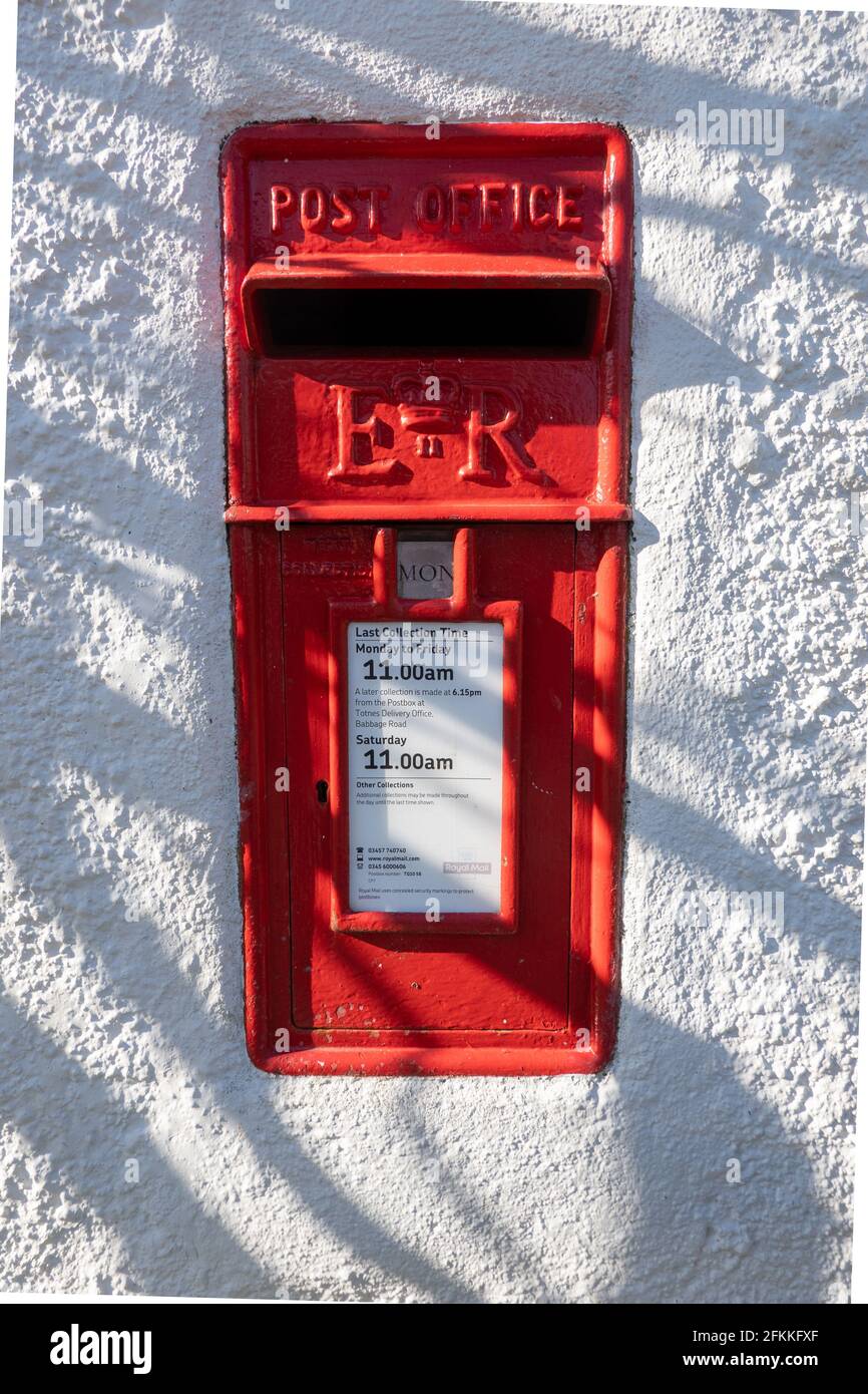 Red Letter box set in white wall Stock Photo - Alamy