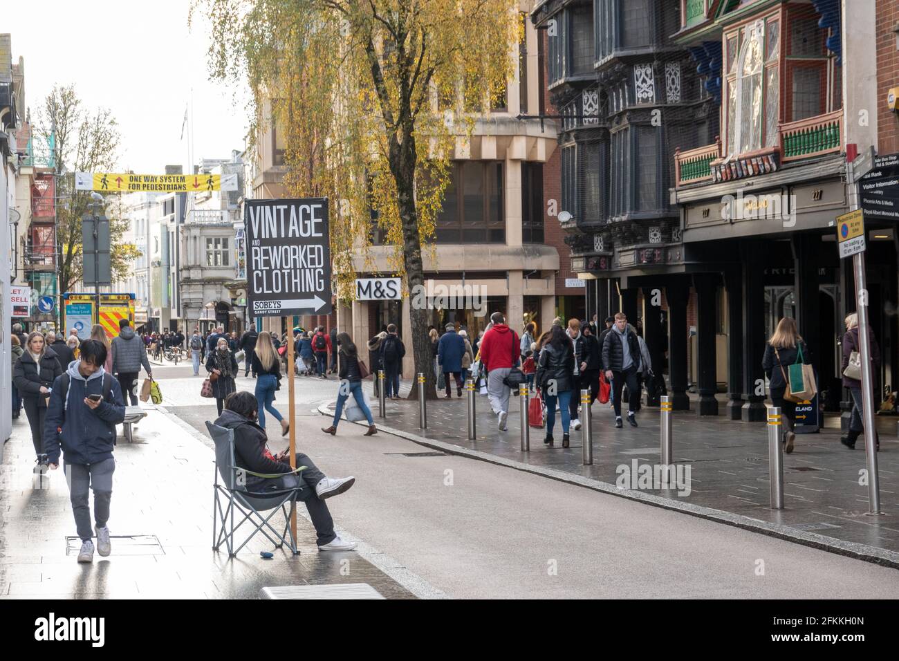Exeter High Street - hand held sign Stock Photo - Alamy