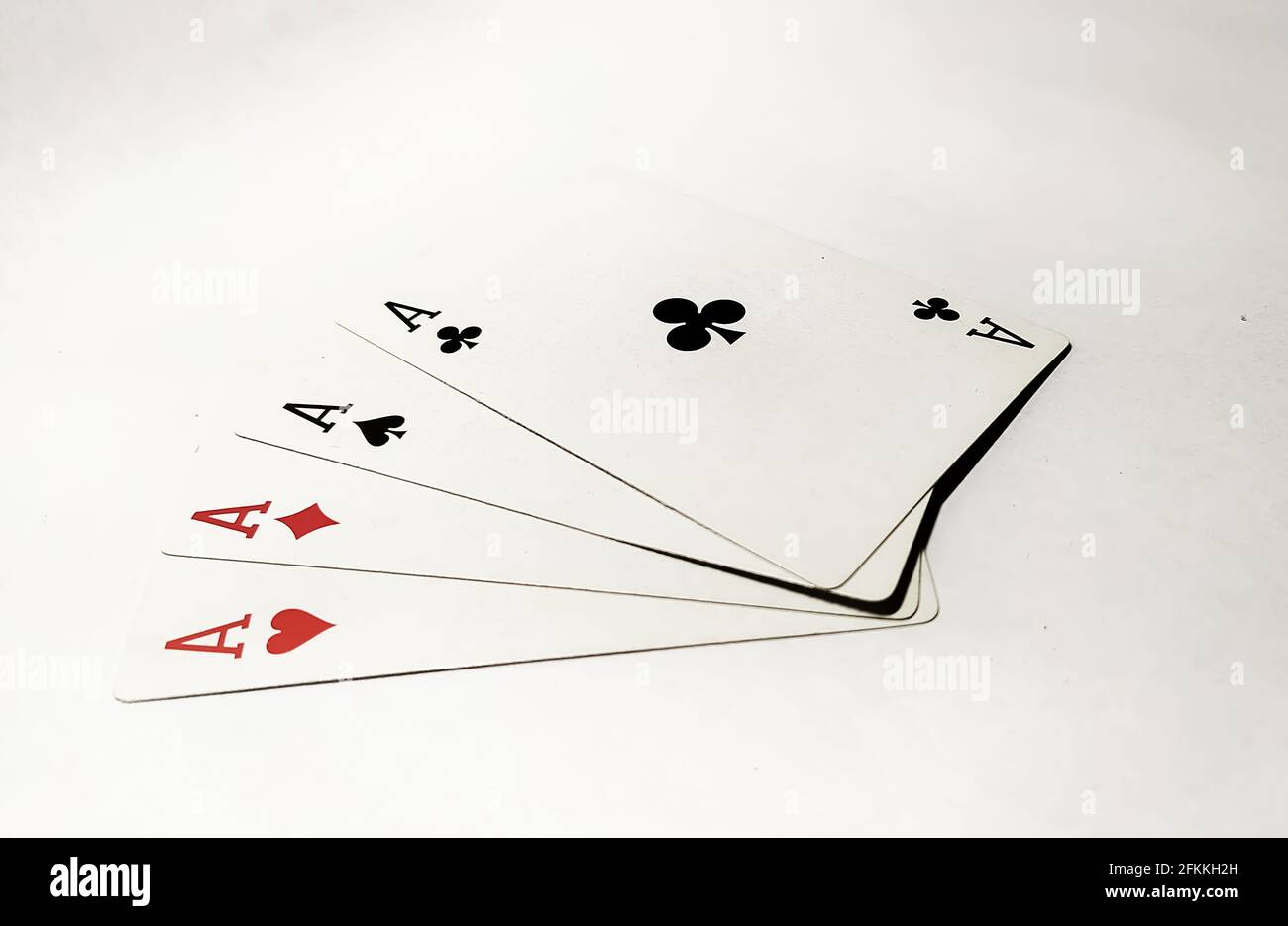The four aces cards isolated on a white background Stock Photo - Alamy
