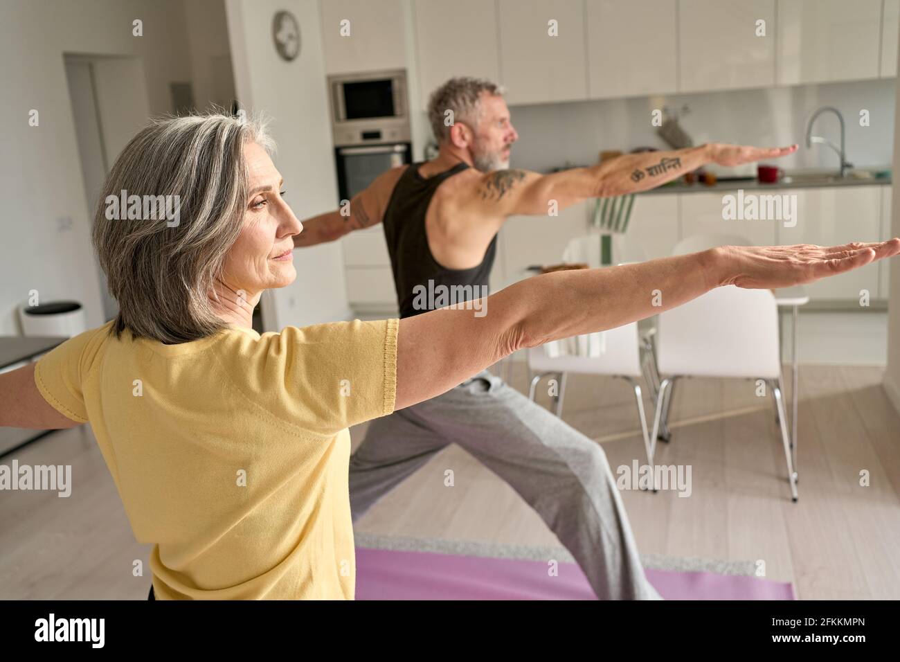 Senior woman exercise at home hi-res stock photography and images - Alamy