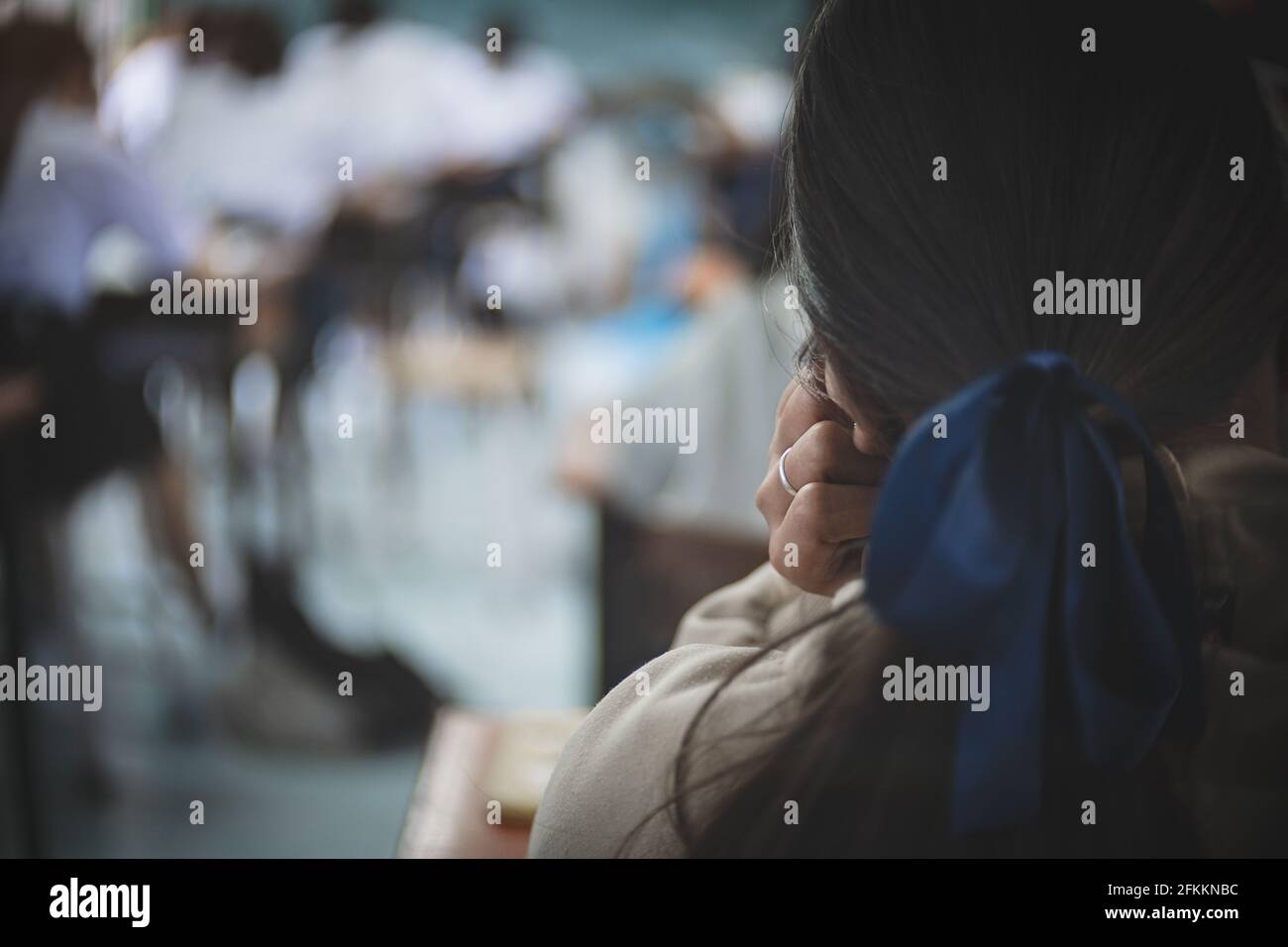 Students taking exam with stress in school classroom Stock Photo - Alamy