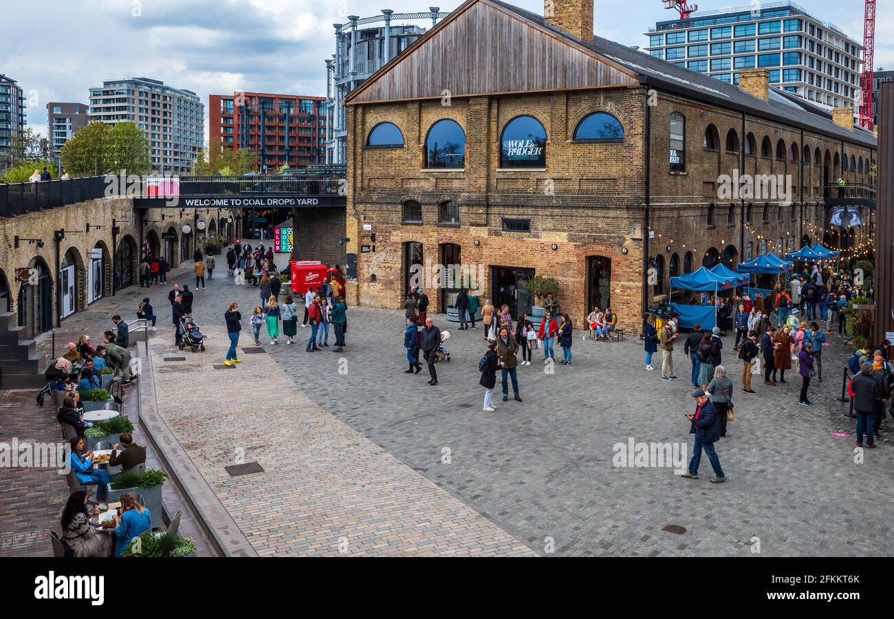 Coal Drops Yard Kings Cross London - shoppers and diners on the lower ...