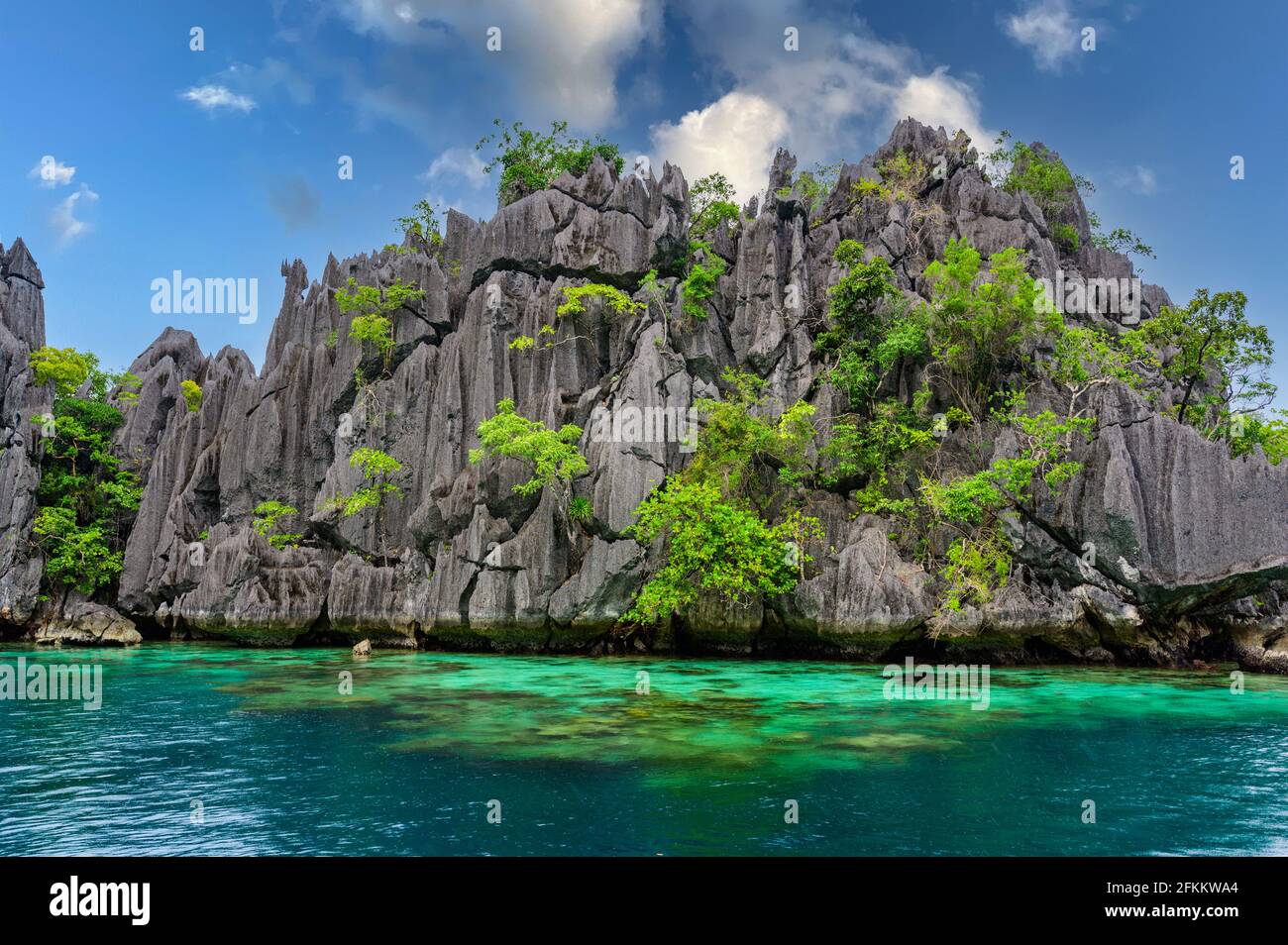 Twin Lagoon on paradise island with sharp limestone rocks, tropical ...