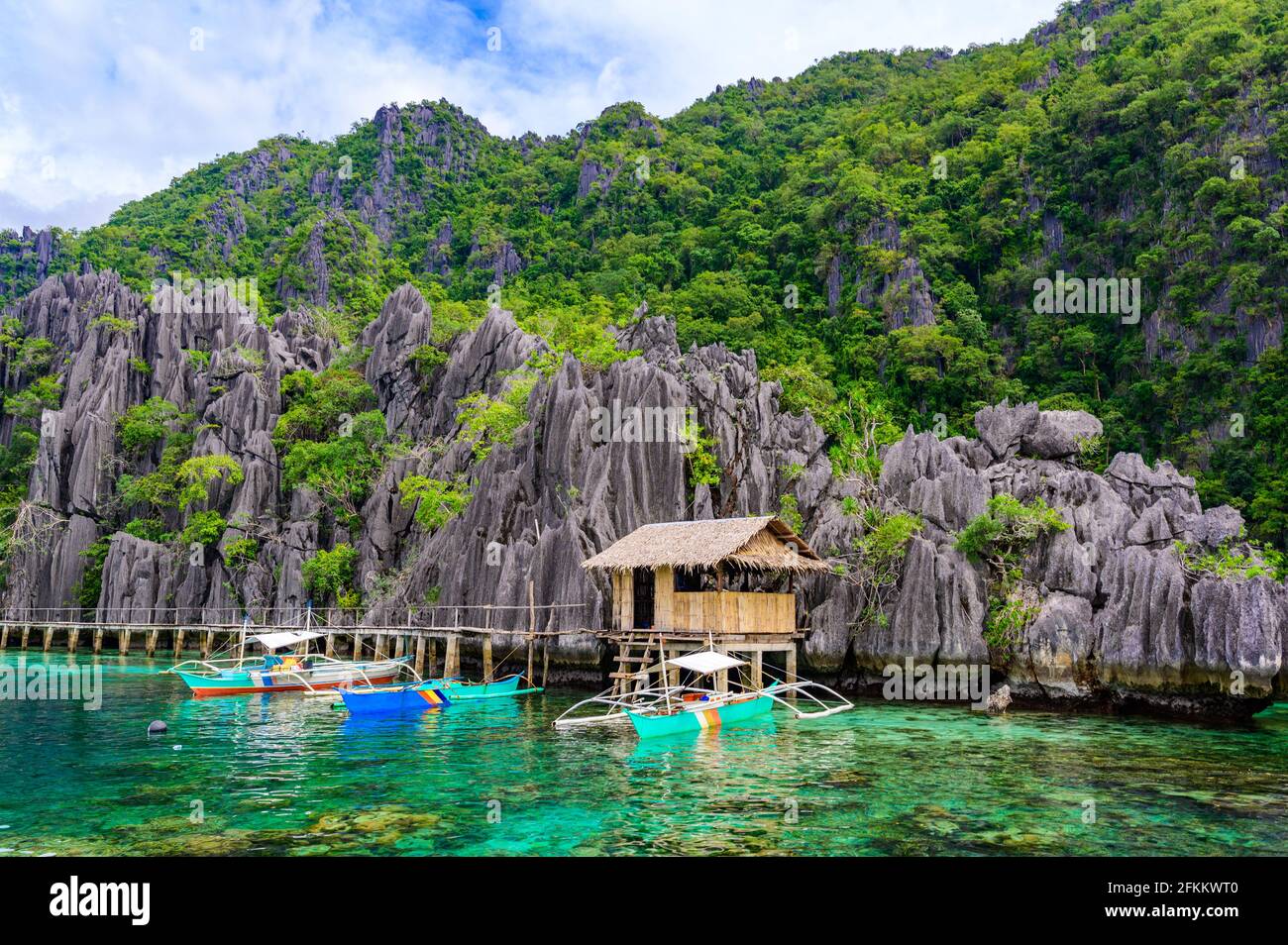 Twin Lagoon on paradise island with sharp limestone rocks, tropical ...