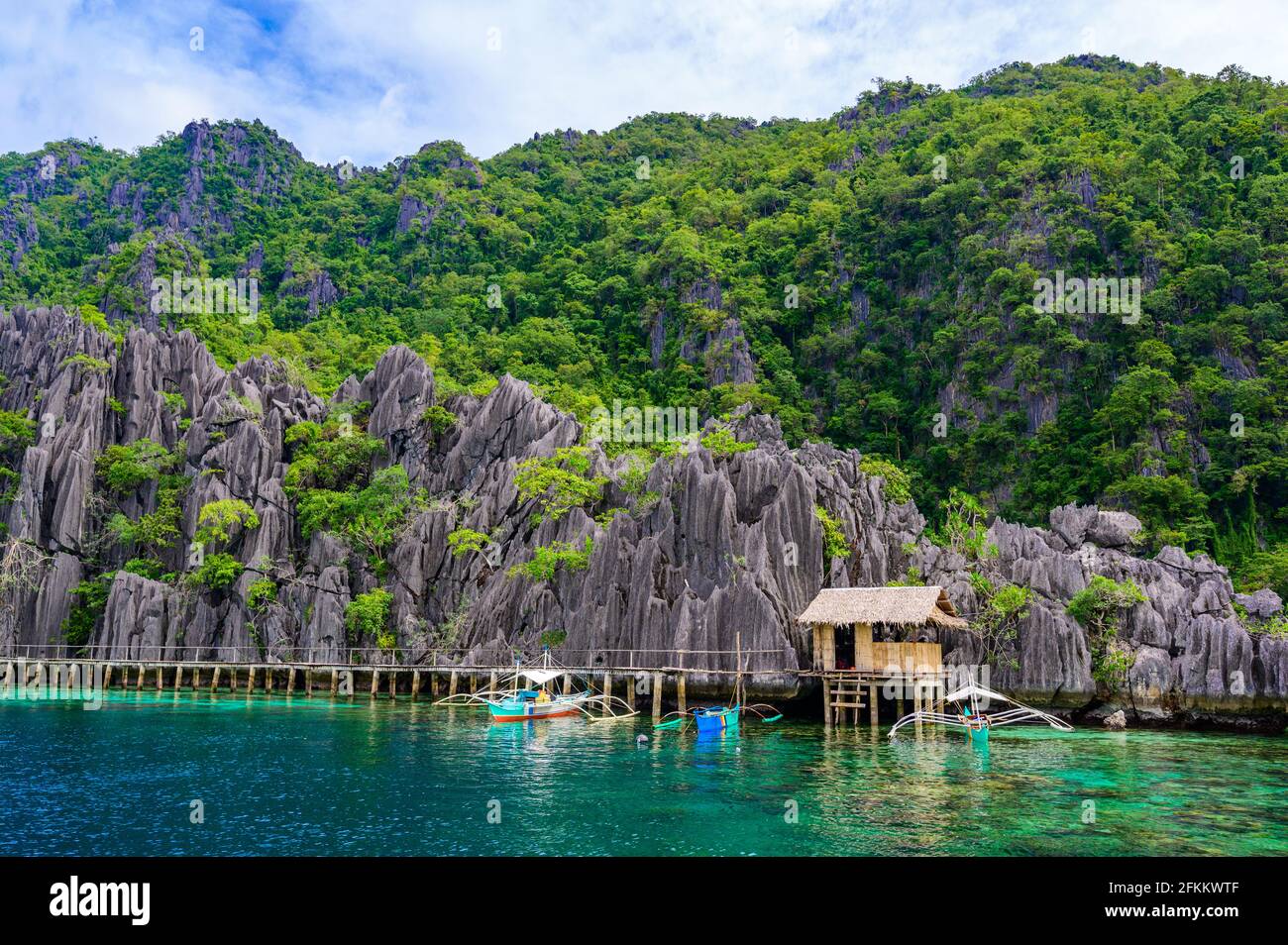 Twin Lagoon on paradise island with sharp limestone rocks, tropical ...