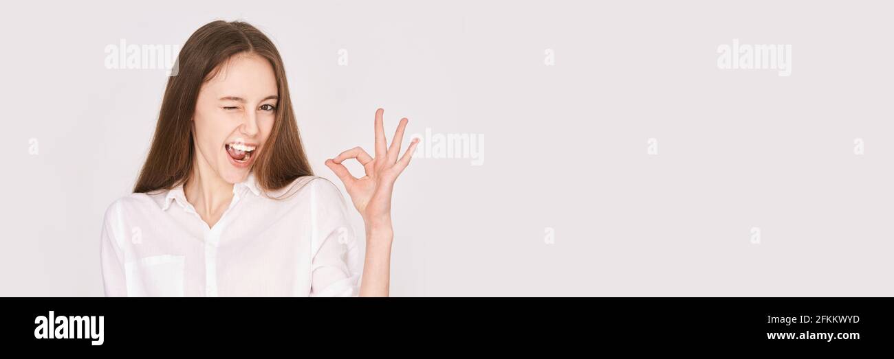 Happy smile emotion. Approve ok gesture. Attractive teenager. Wink eye ...