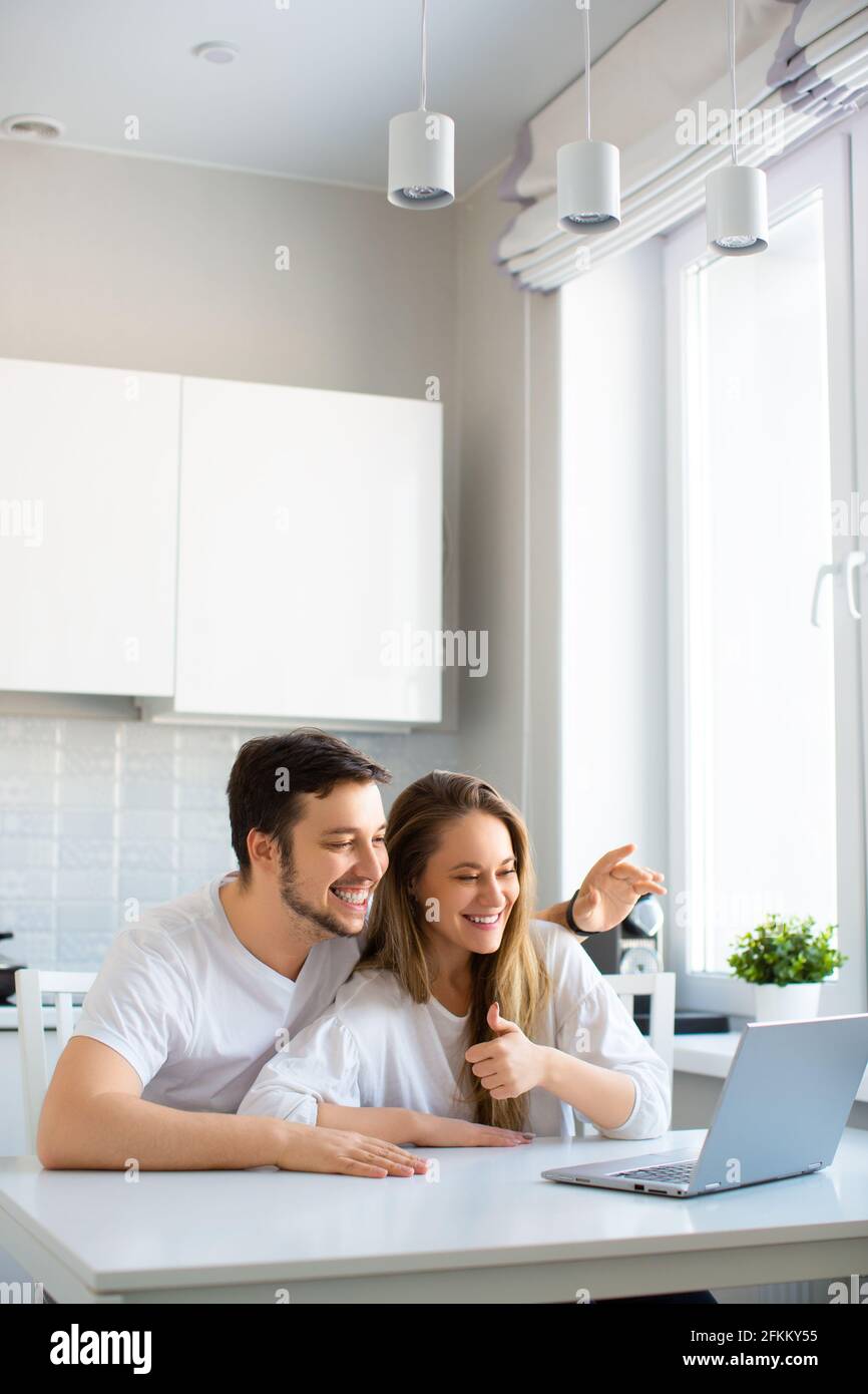 Vertical photo - online meet with relatives or friends. Happy smiling ...