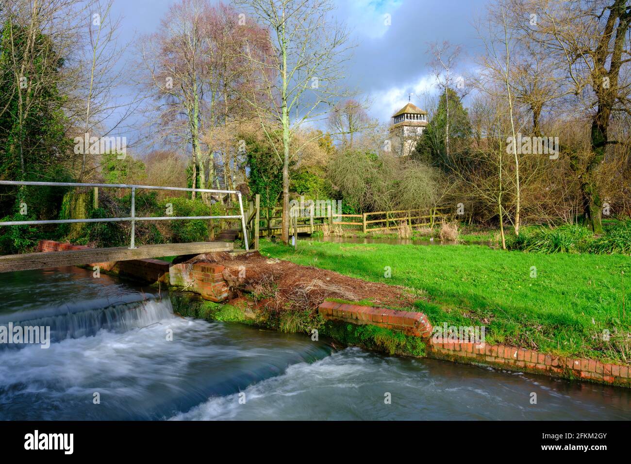 Meonstoke, UK - January 29, 2020: St Andrew's Church and the river Meon ...