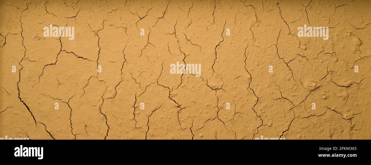 panoramic view of cracked yellow soil Stock Photo - Alamy