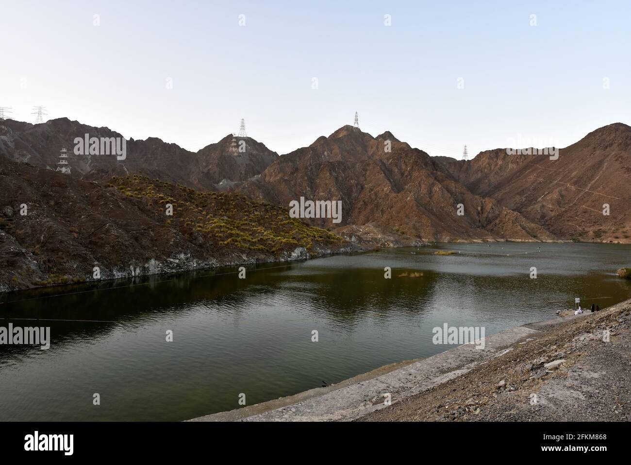 A mesmerizing scenery of a river and mountains in Al Rafisah Dam ...