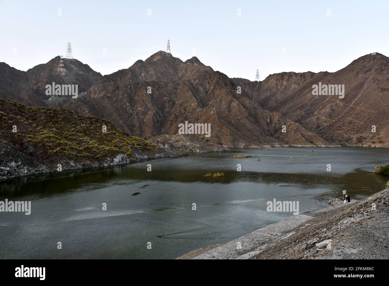 A mesmerizing scenery of a river and mountains in Al Rafisah Dam ...